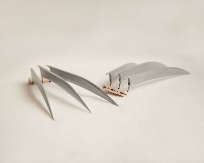 Les griffes de Wolverine métal et os